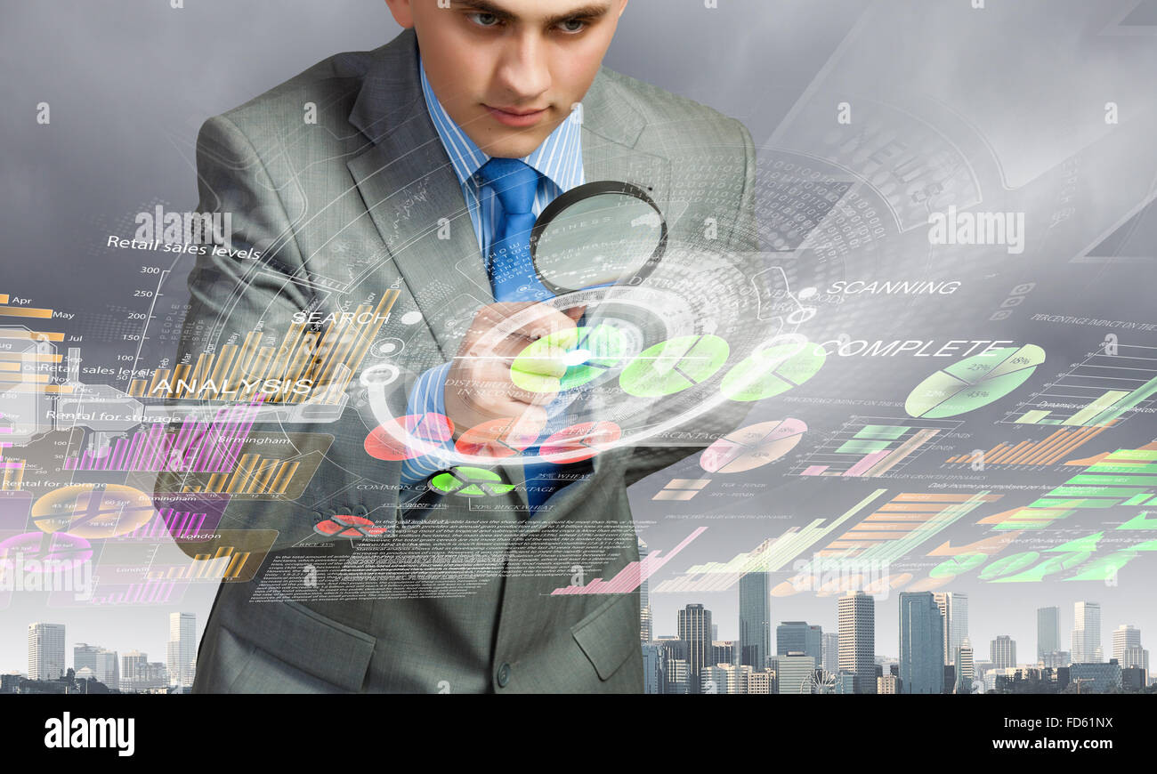 Image of businessman examining objects with magnifier Stock Photo - Alamy