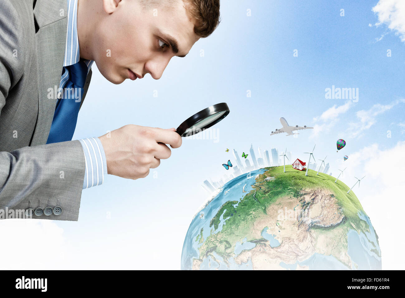 Image of businessman examining objects with magnifier. Elements of this ...