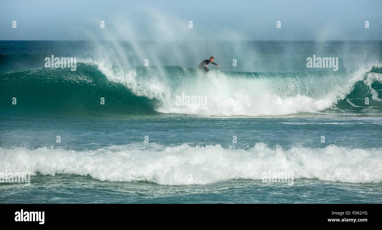 Surfer riding perfect wave Stock Photo - Alamy