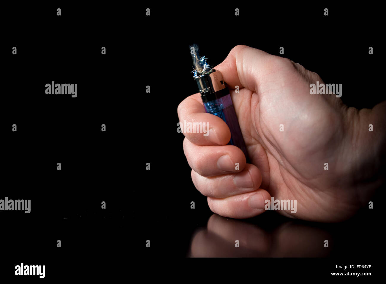 Holding lighter hi-res stock photography and images - Alamy