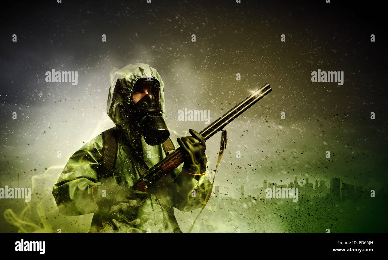 Image of stalker with gun. Ecology catastrophe Stock Photo - Alamy