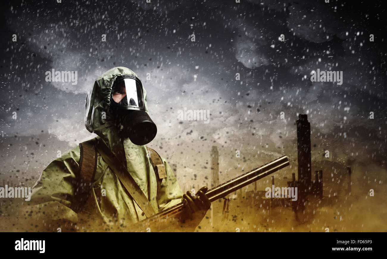 Image of stalker with gun. Ecology catastrophe Stock Photo - Alamy