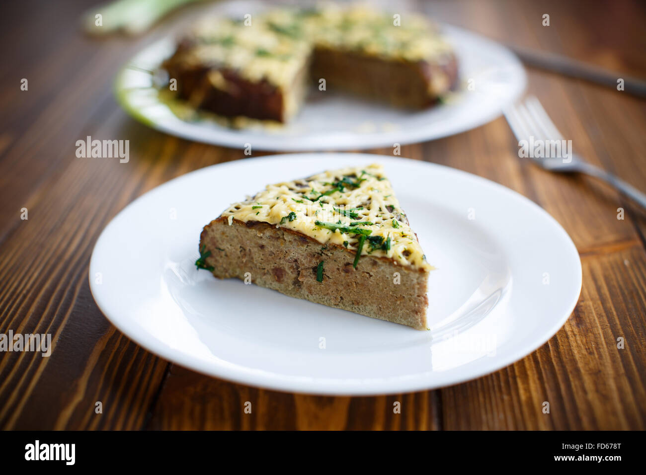 liver pie with cheese and herbs Stock Photo - Alamy