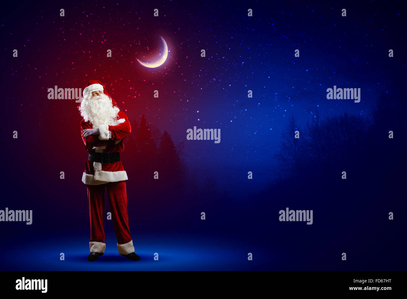 Image of Santa Claus against night sky background Stock Photo - Alamy