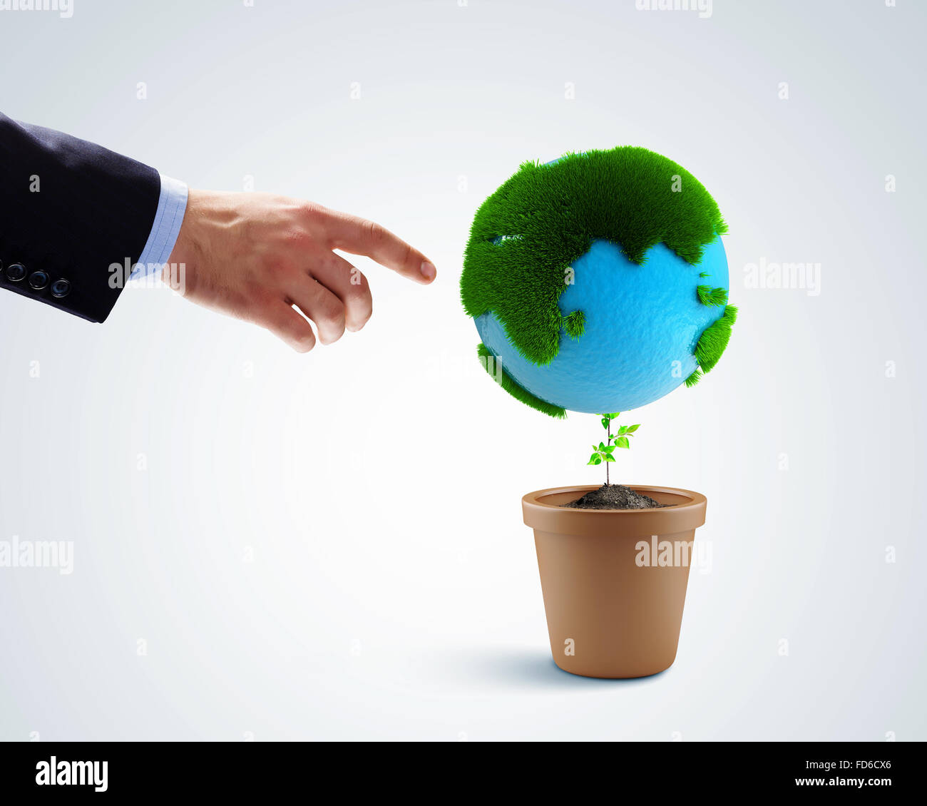 Image of Earth planet growing in plant pot Stock Photo - Alamy