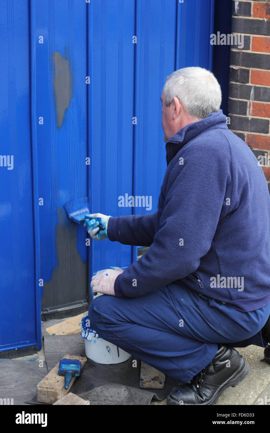 A painter at work Stock Photo - Alamy