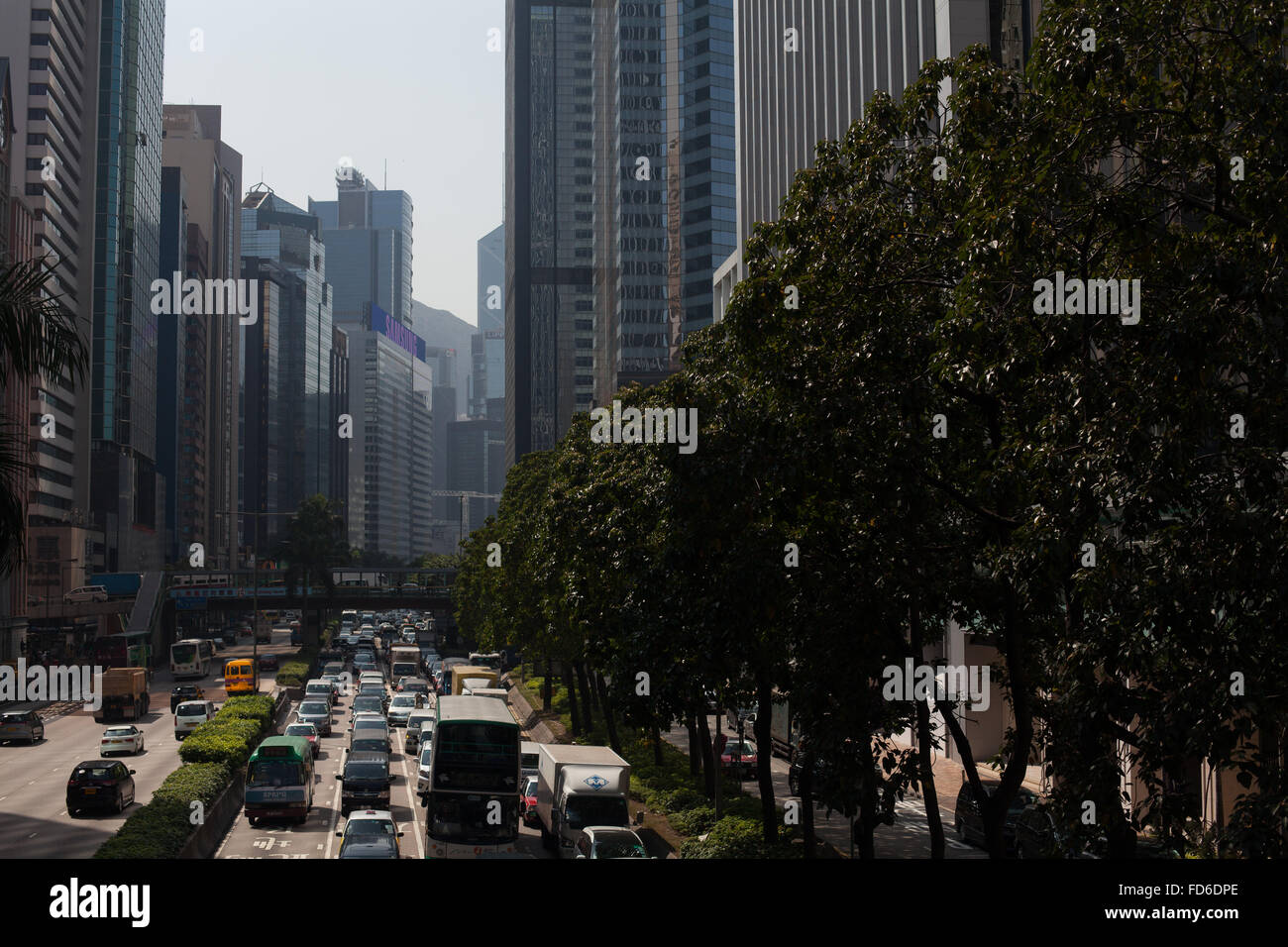 Vehicles On Street Alongside Buildings City Stock Photo - Alamy