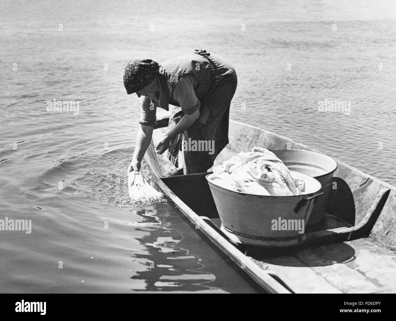 Laundry washing at a river, 1940 Stock Photo - Alamy