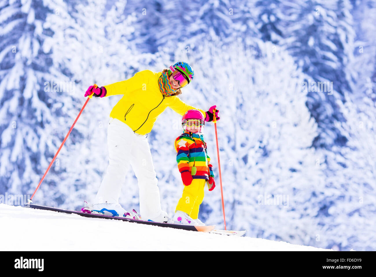 Child skiing in mountains. Active toddler kid with safety helmet ...