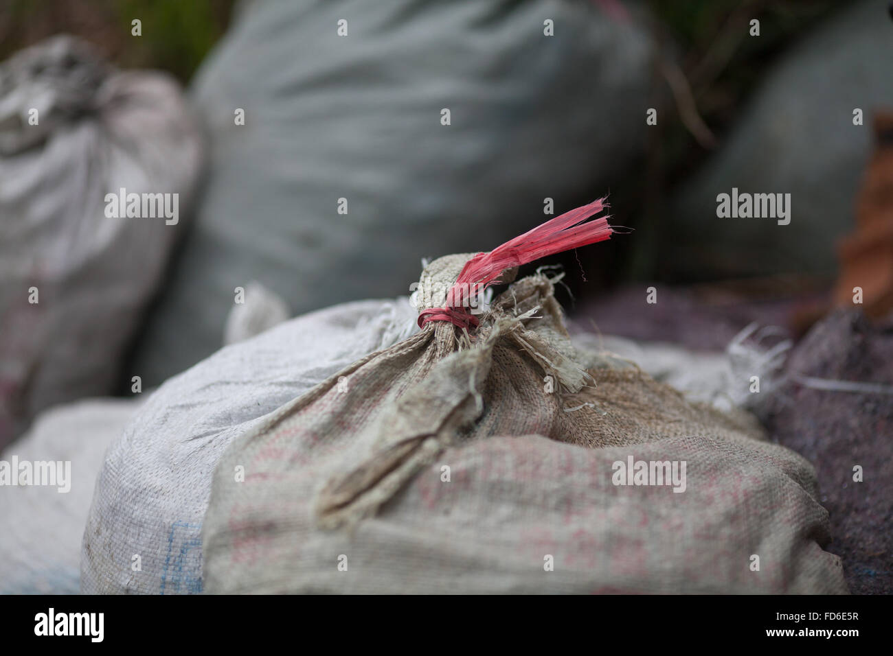 Burlap sack tied hi-res stock photography and images - Alamy