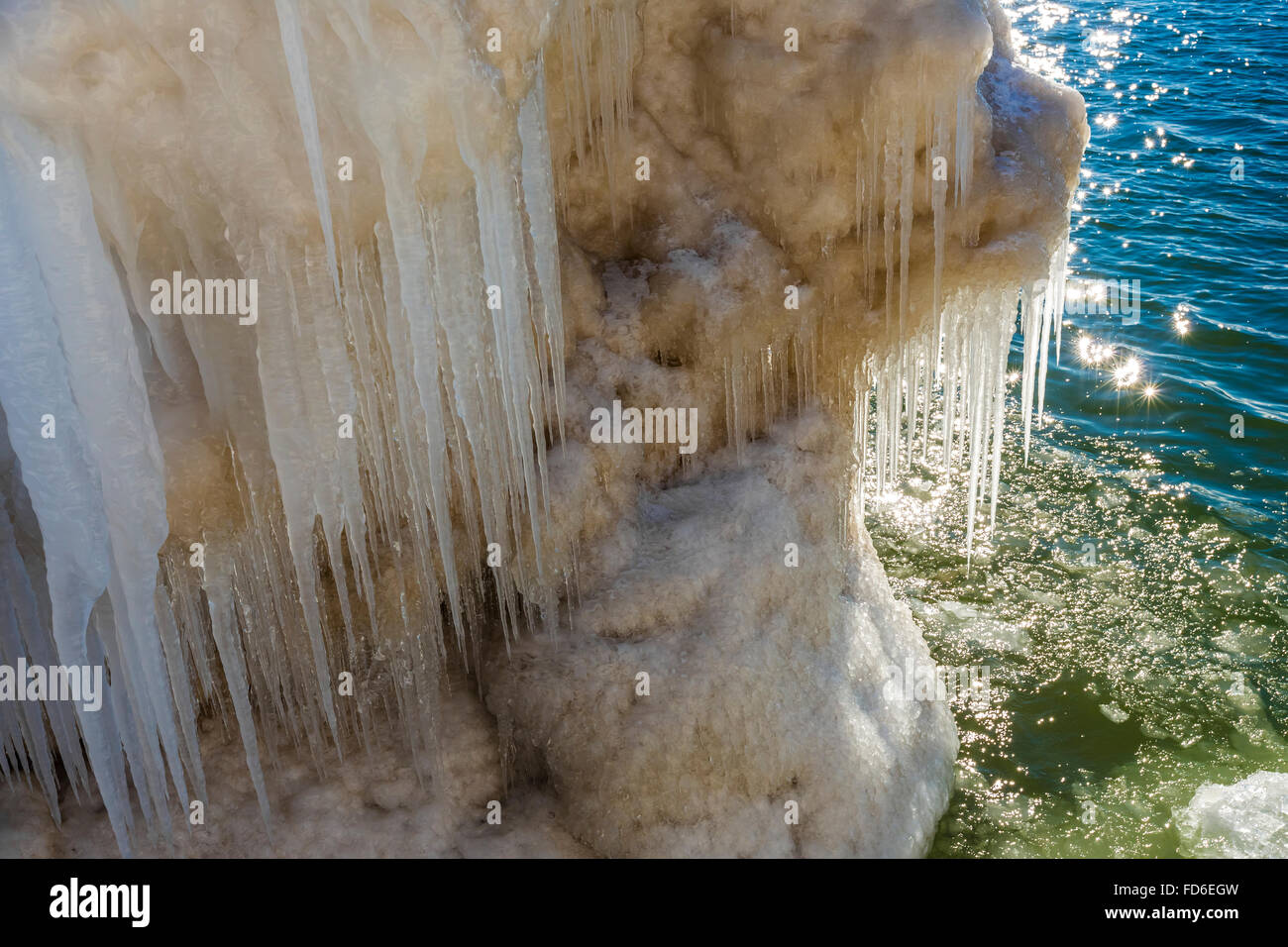 Icicles formed from spray of Lake Michigan waves crashing in, Rosy ...