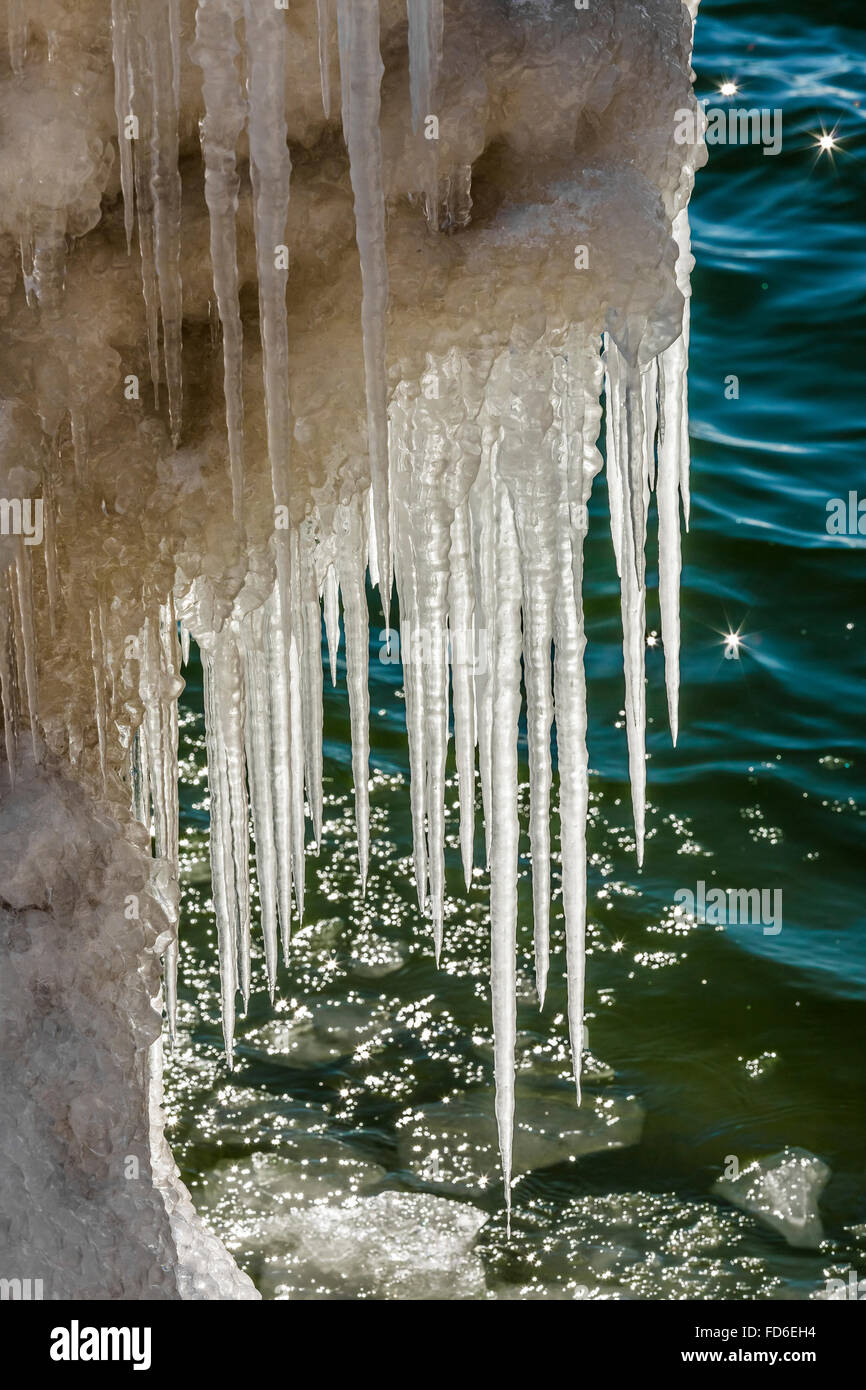 Icicles formed from spray of Lake Michigan waves crashing in, Rosy ...