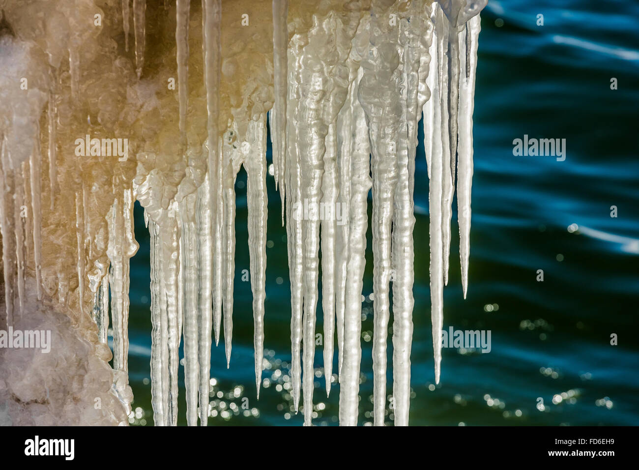 Icicles formed from spray of Lake Michigan waves crashing in, Rosy ...