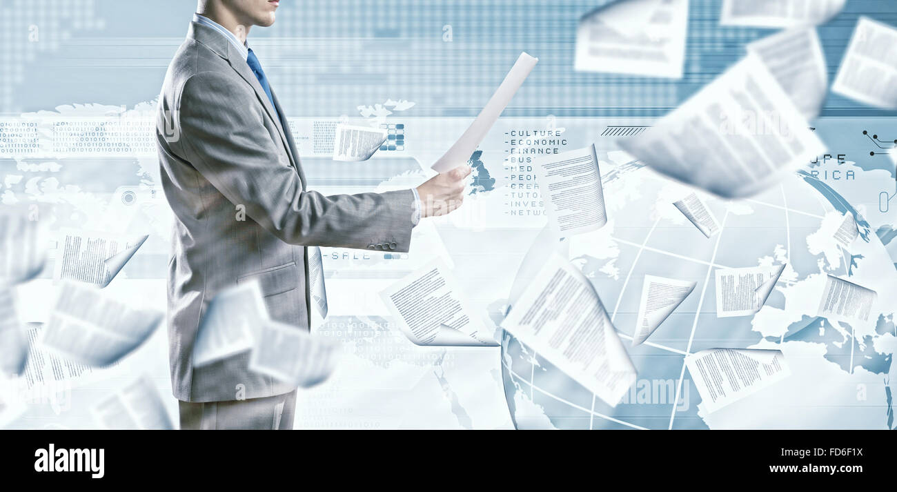 Businessman examining document in hands. Signing contract Stock Photo ...