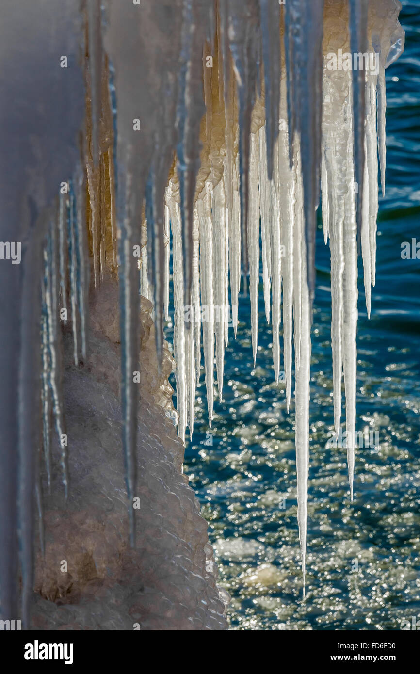 Icicles formed from spray of Lake Michigan waves crashing in, Rosy ...