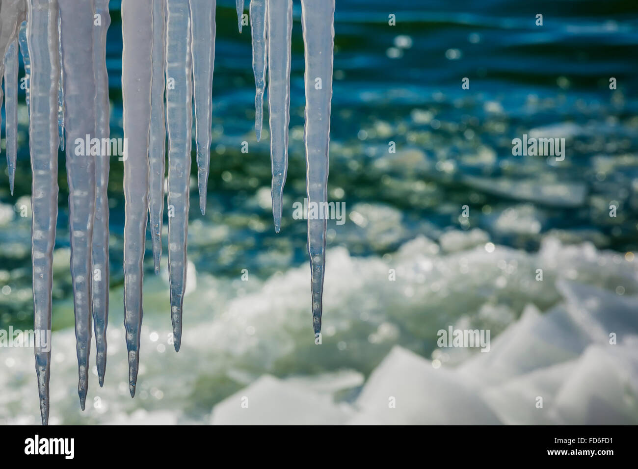 Icicles formed from spray of Lake Michigan waves crashing in, Rosy ...