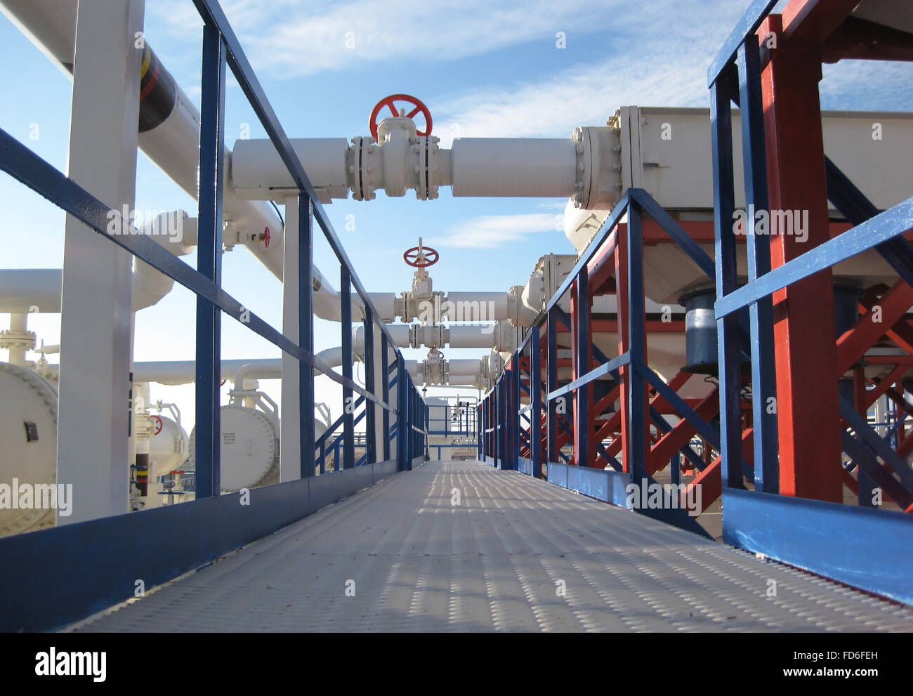 Steel service platform and stairs. Equipment refinery Stock Photo - Alamy