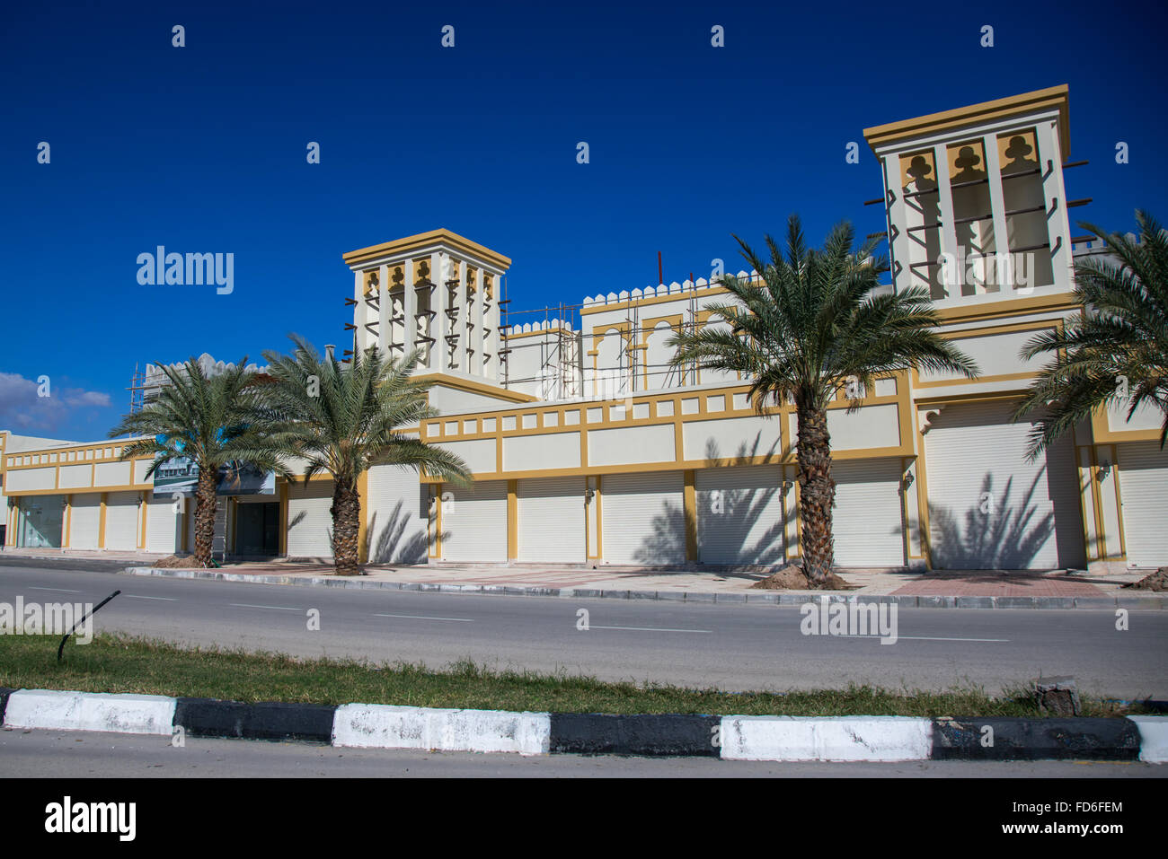 shopping center with traditional wind towers, Hormozgan, Bandar-e Kong ...