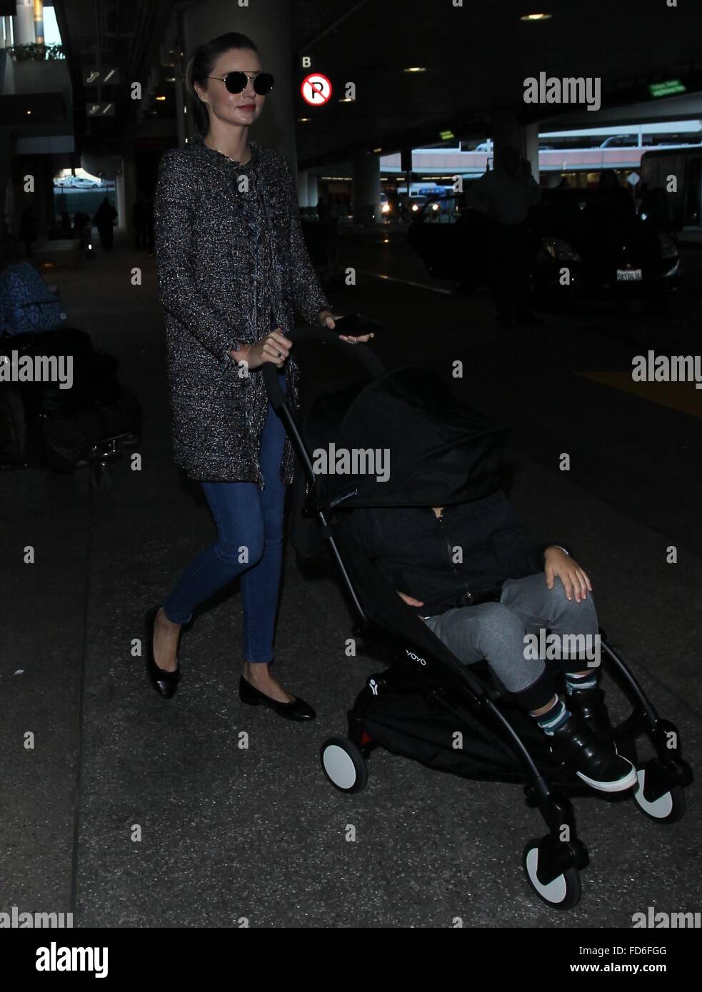 Miranda Kerr and son Flynn Christopher Bloom arrive at Los Angeles ...