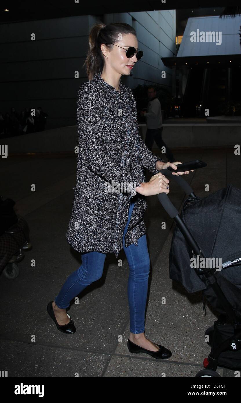 Miranda Kerr and son Flynn Christopher Bloom arrive at Los Angeles ...