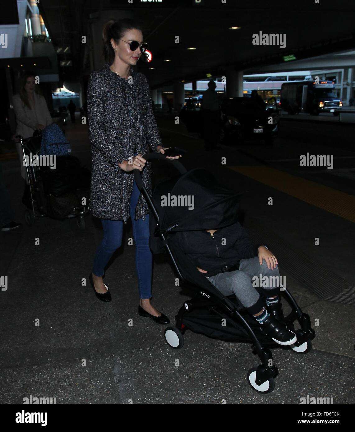 Miranda Kerr and son Flynn Christopher Bloom arrive at Los Angeles ...