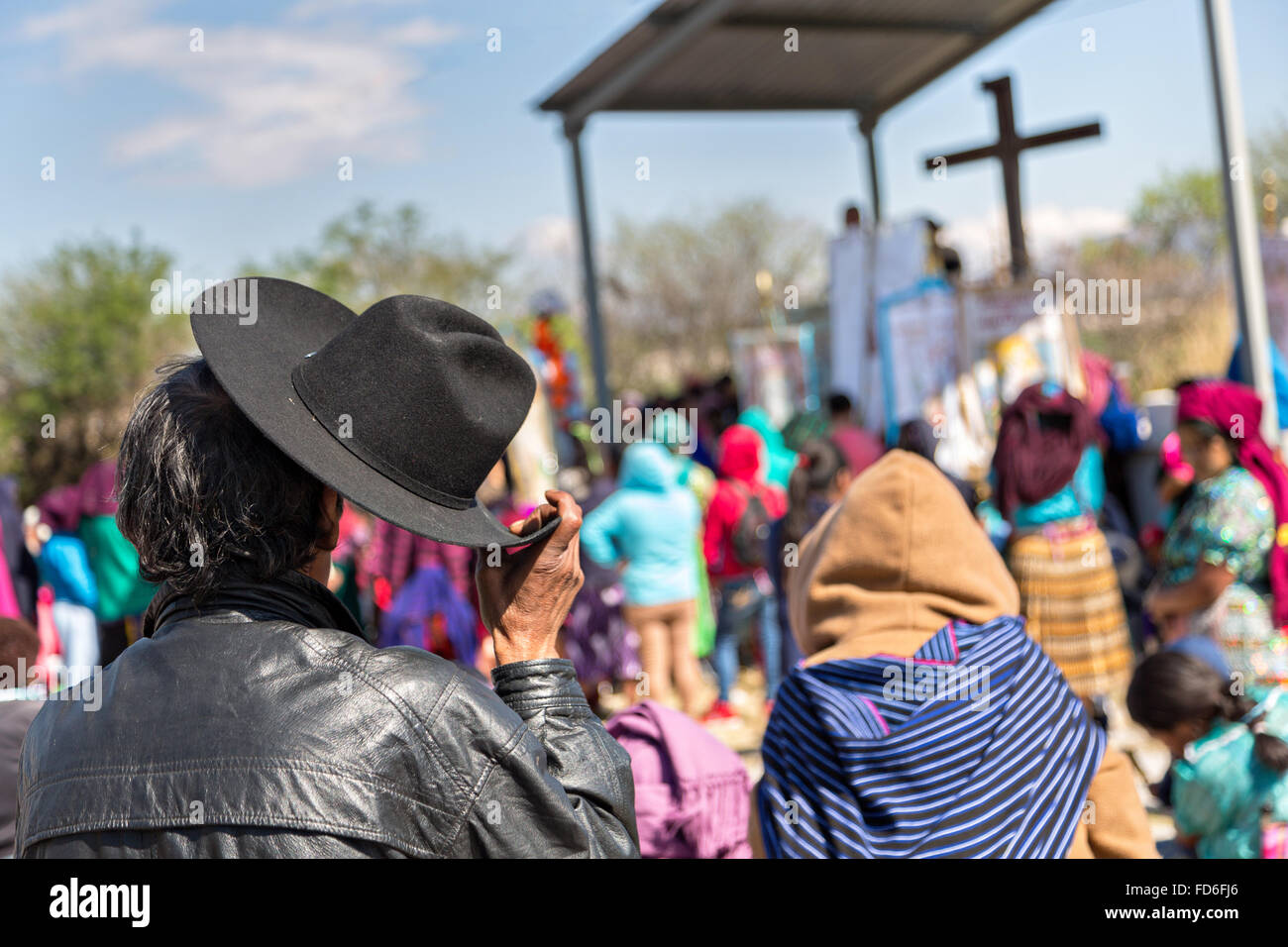 Indigenous pilgrims listen to an outdoor mass on the pilgrimage route ...