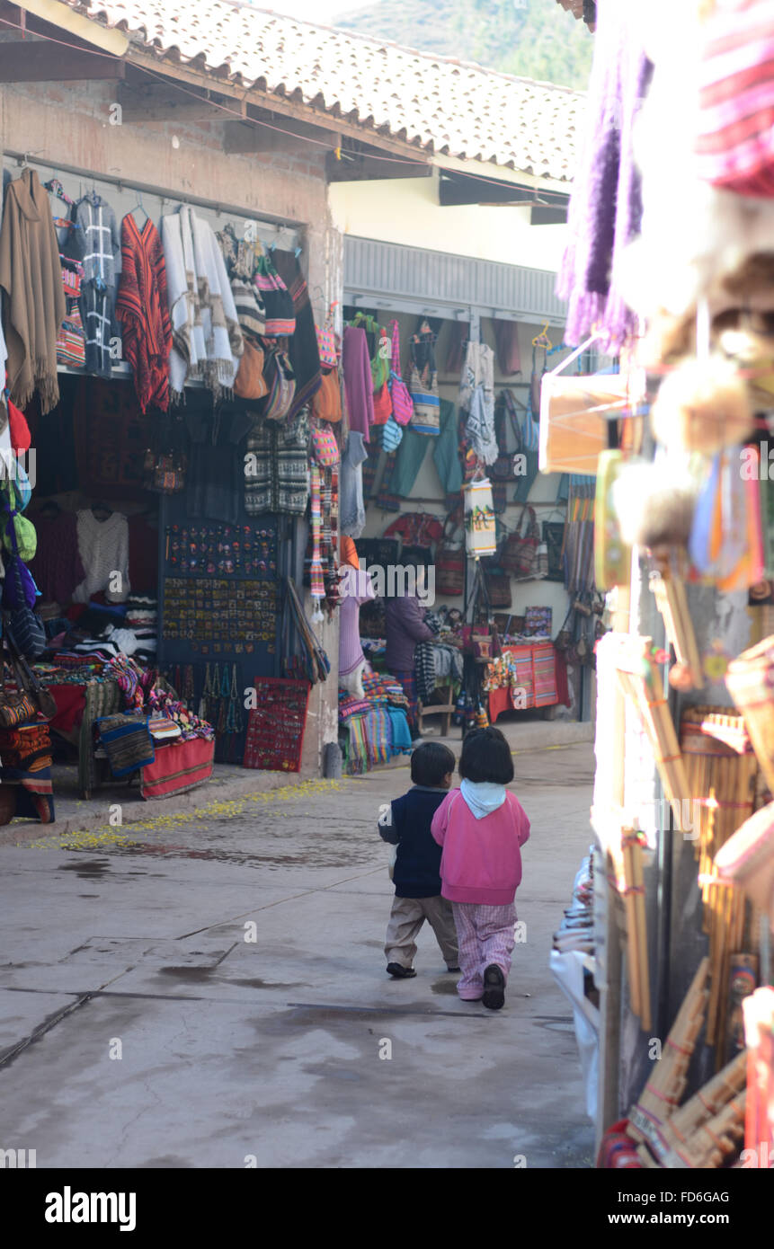 Children Walking In A Street Market Stock Photo - Alamy