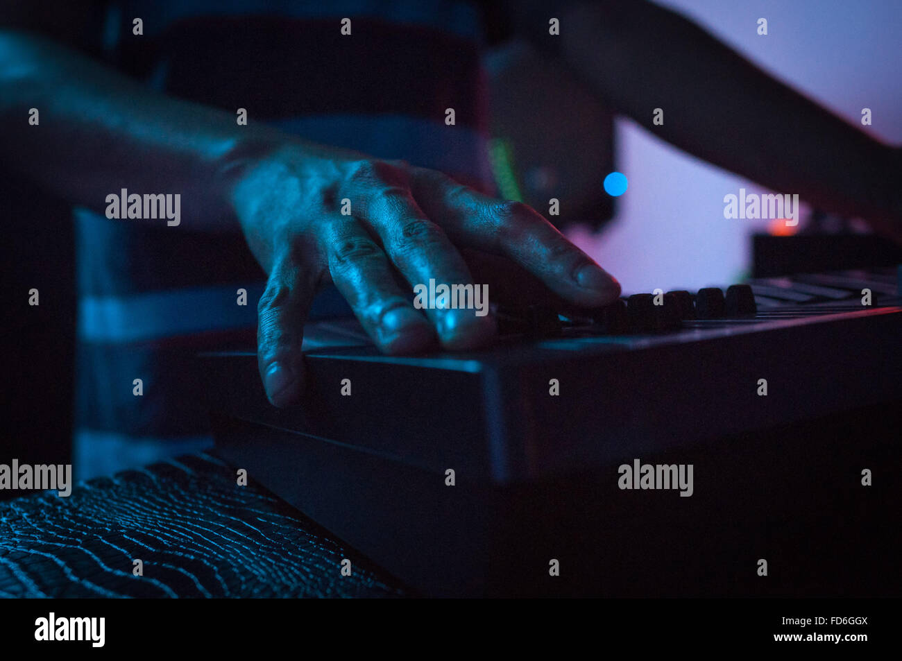 Dj Operating A Sound Mixer Stock Photo - Alamy
