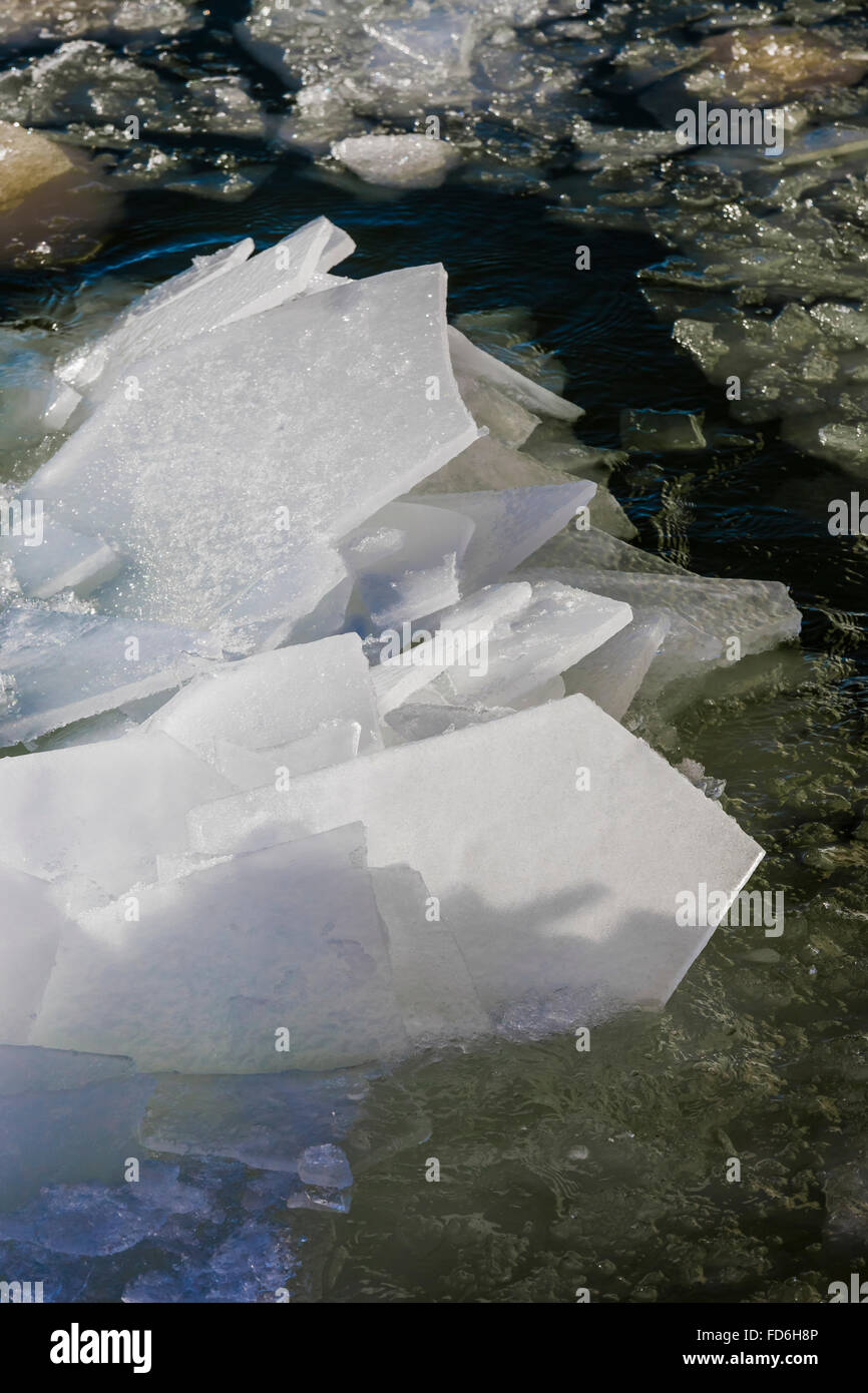 Flat plates of lake ice, broken up by the waves, then refrozen together ...