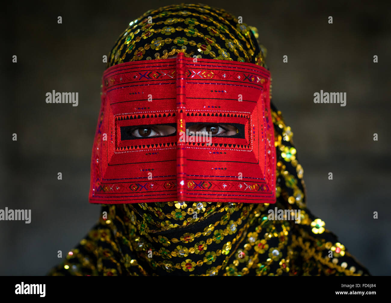 a bandari woman wearing a traditional mask called the burqa, Hormozgan ...