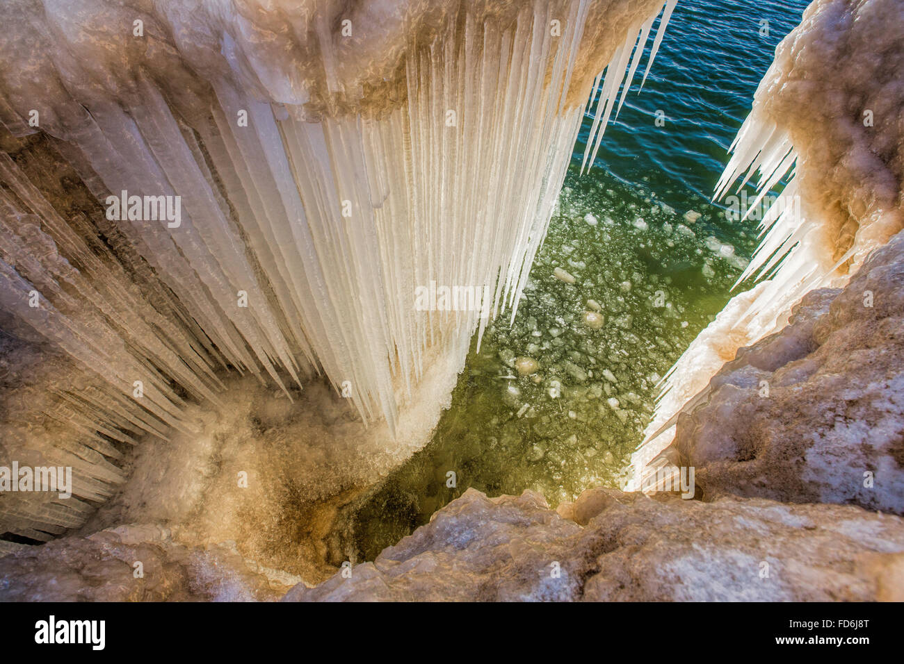 Icicles formed from spray of Lake Michigan waves crashing in, Rosy ...