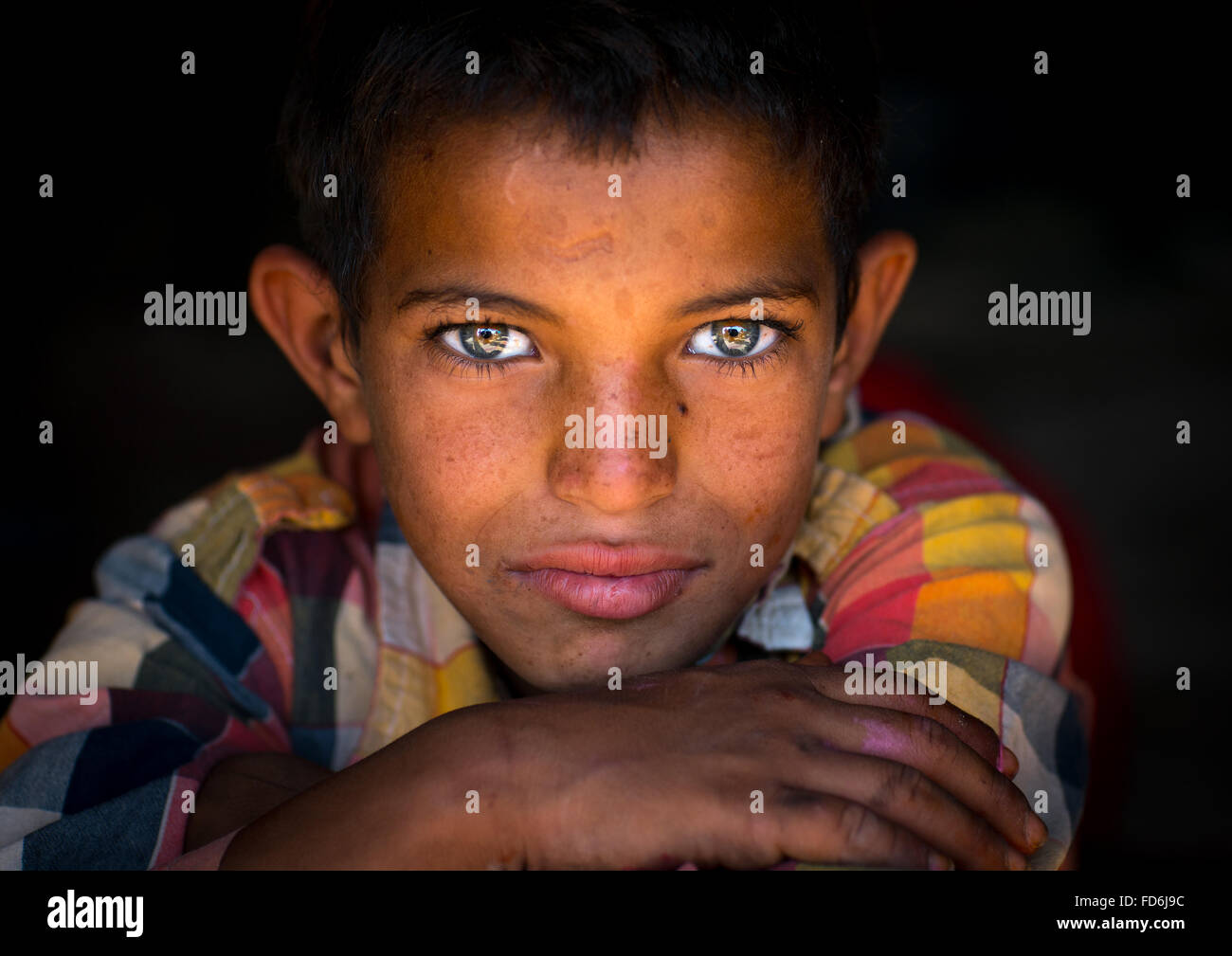gypsy boy with beautiful eyes, Central County, Kerman, Iran Stock Photo ...