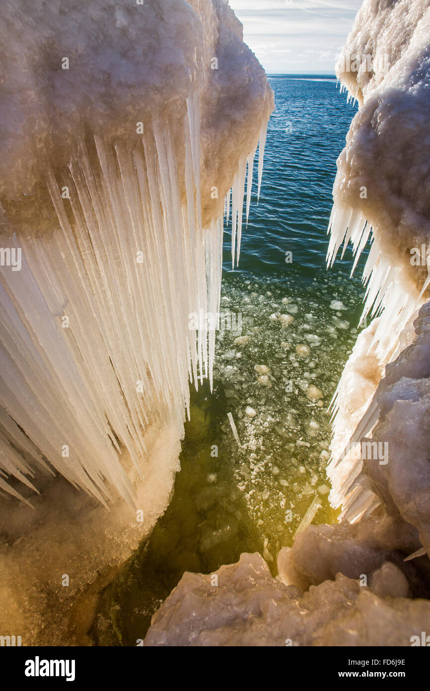 Icicles formed from spray of Lake Michigan waves crashing in, Rosy ...