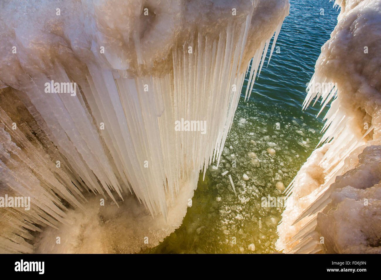 Icicles formed from spray of Lake Michigan waves crashing in, Rosy ...