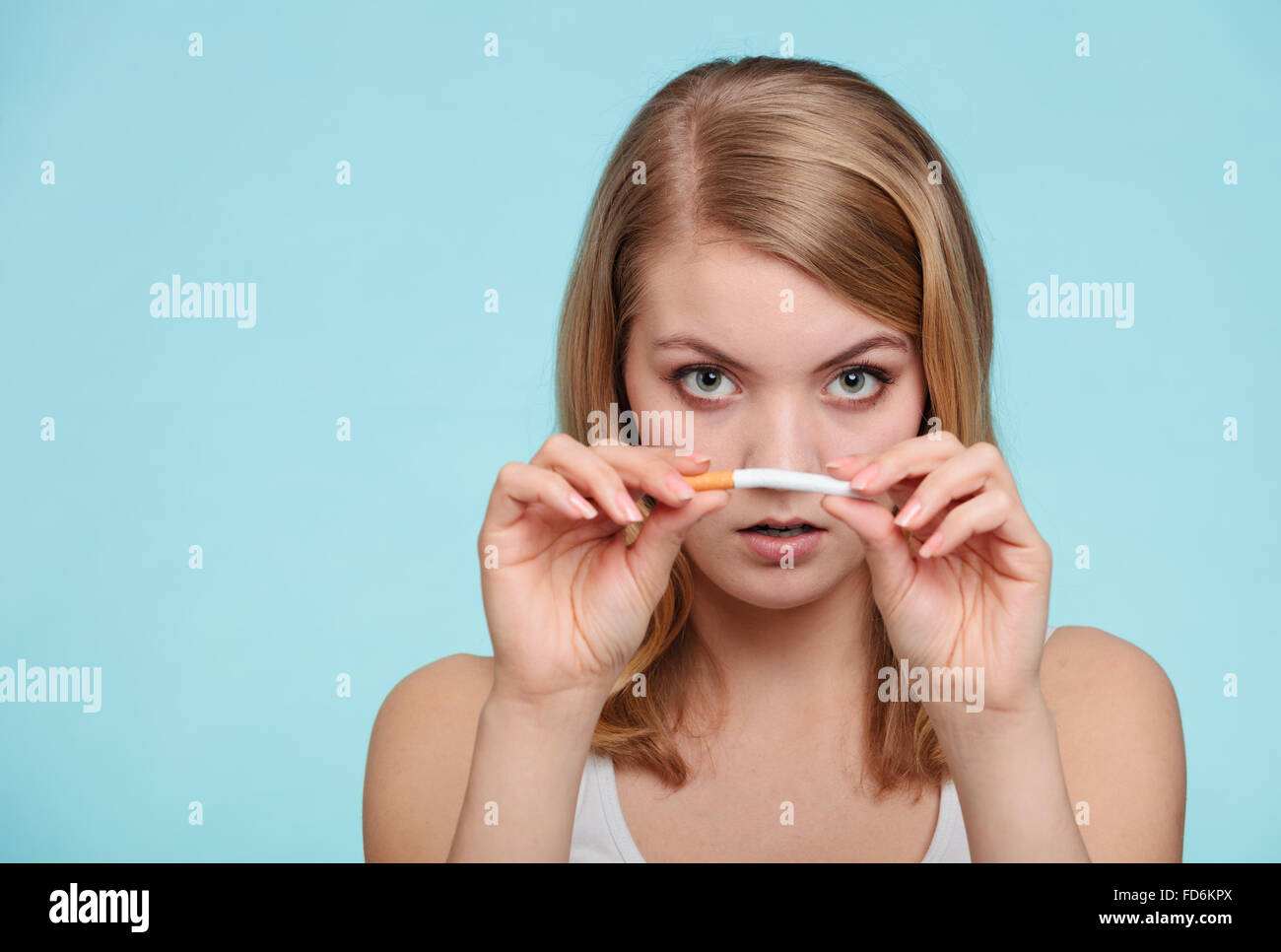 Pretty girl breake down cigarette. Addicted nicotine problems in young ...