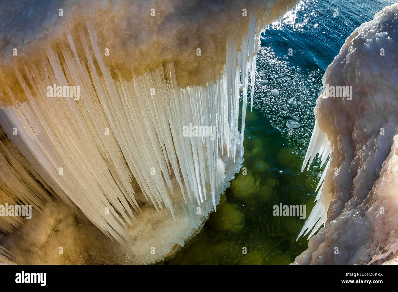 Icicles formed from spray of Lake Michigan waves crashing in, Rosy ...