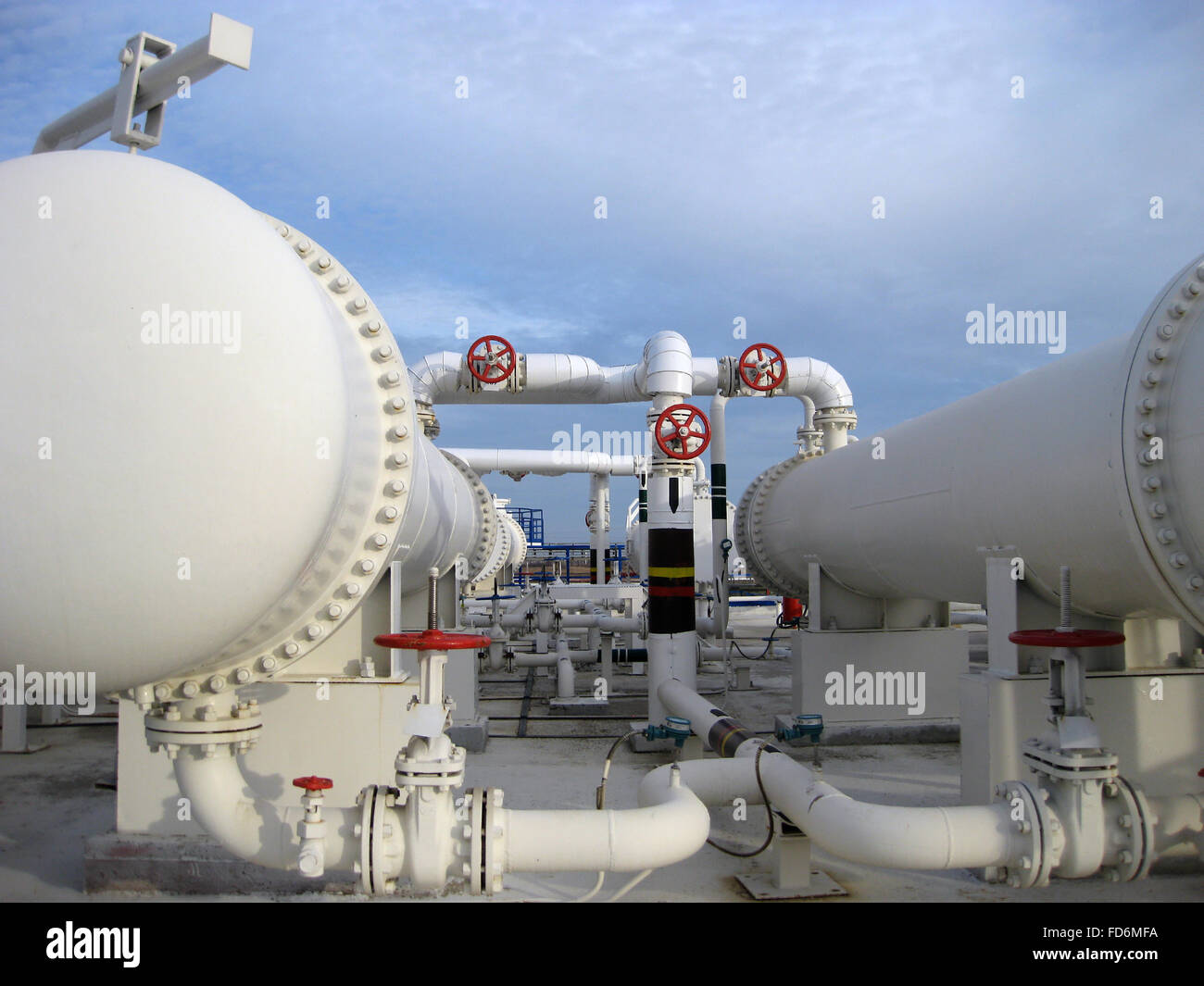 Heat exchangers in a refinery. The equipment for oil refining Stock ...