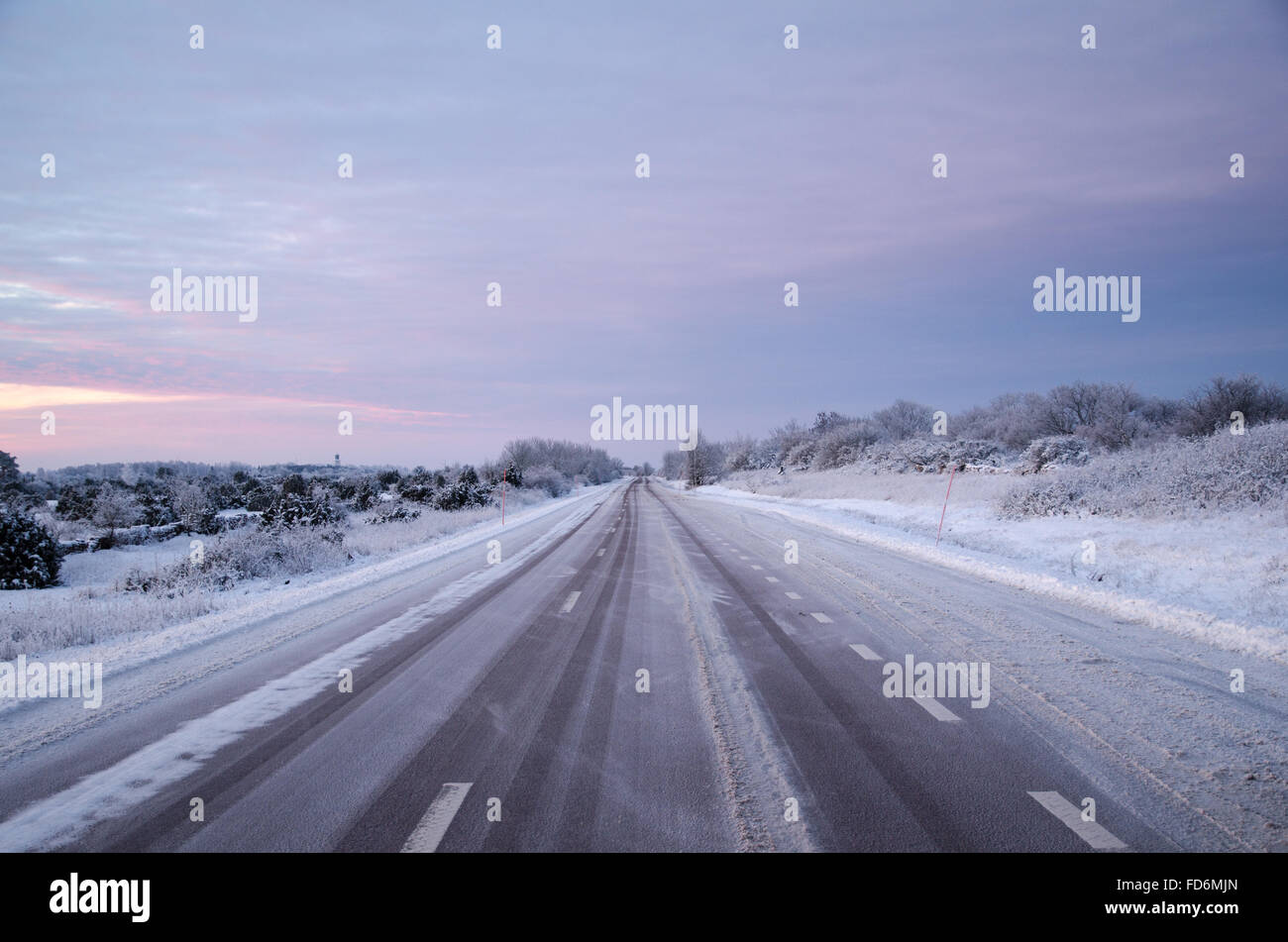 Winter landscape with a snowy asphalt road Stock Photo - Alamy