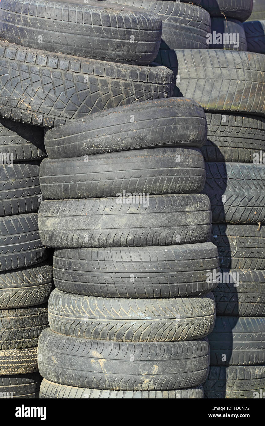 heap of dirty used car tires Stock Photo - Alamy