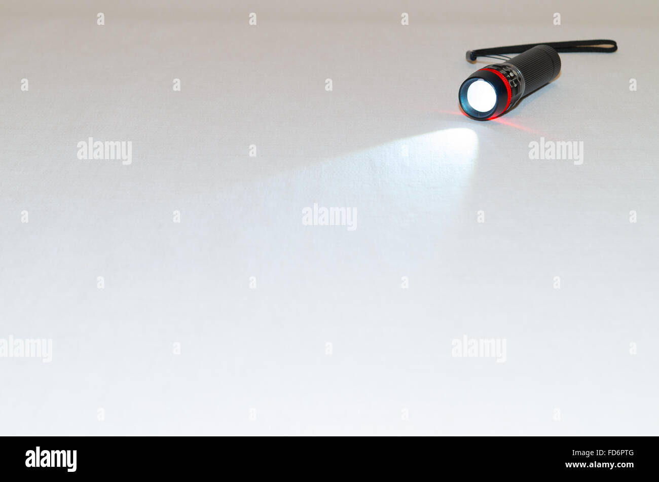 black small led flashlight isolated Stock Photo - Alamy