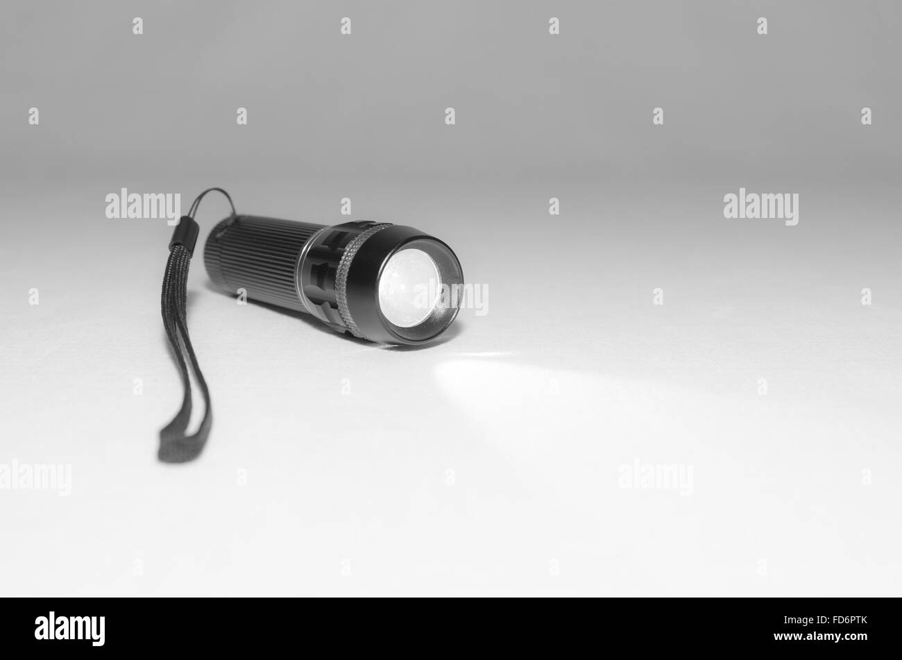 black small led flashlight isolated Stock Photo - Alamy