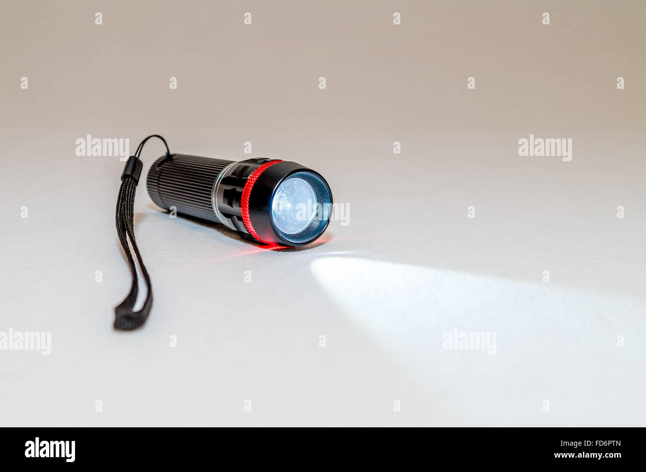 black small led flashlight isolated Stock Photo - Alamy