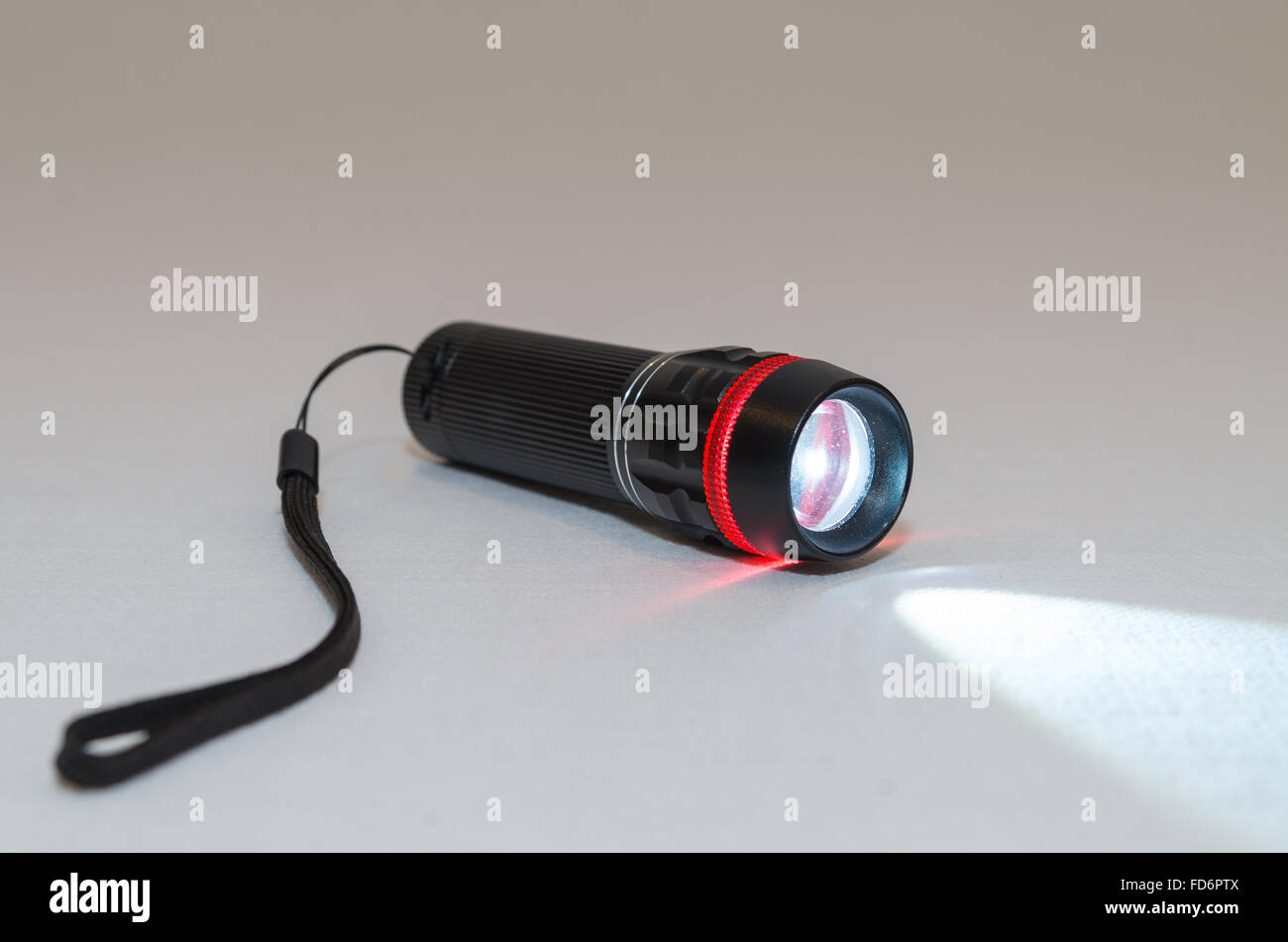 black small led flashlight isolated Stock Photo - Alamy