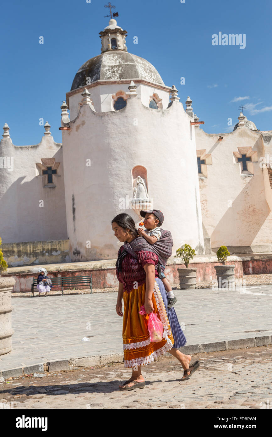 Indigenous pilgrims walk past the Sanctuary of Atotonilco an important ...