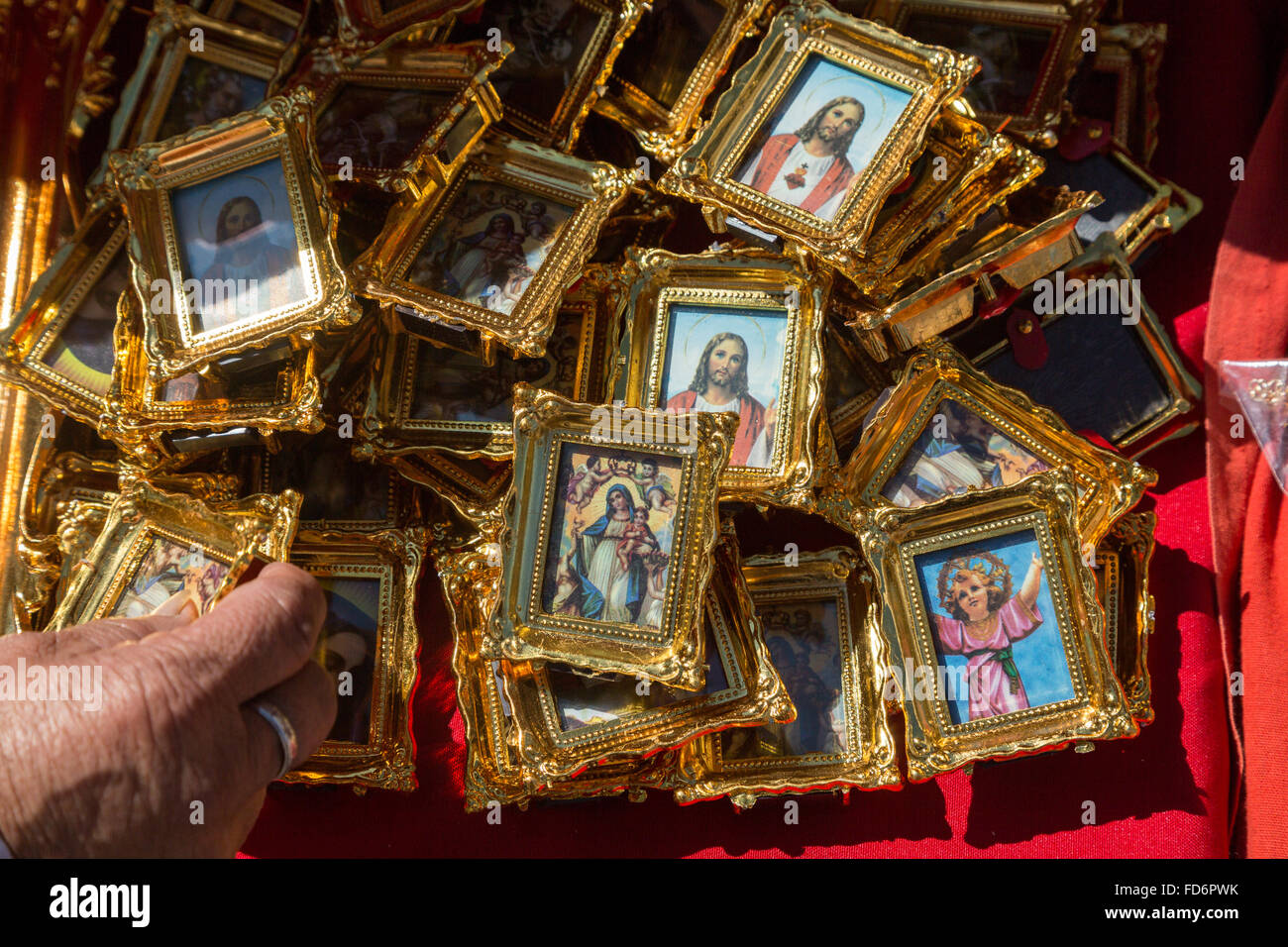 Religious icons and images of saints on sale for Mexican pilgrims and ...