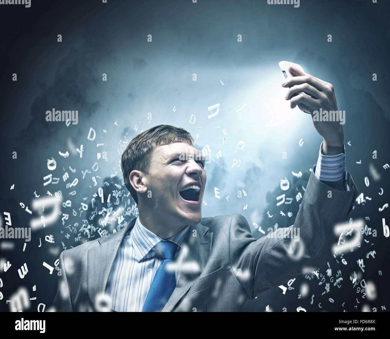 Angry businessman screaming i to mobile furiously phone Stock Photo - Alamy