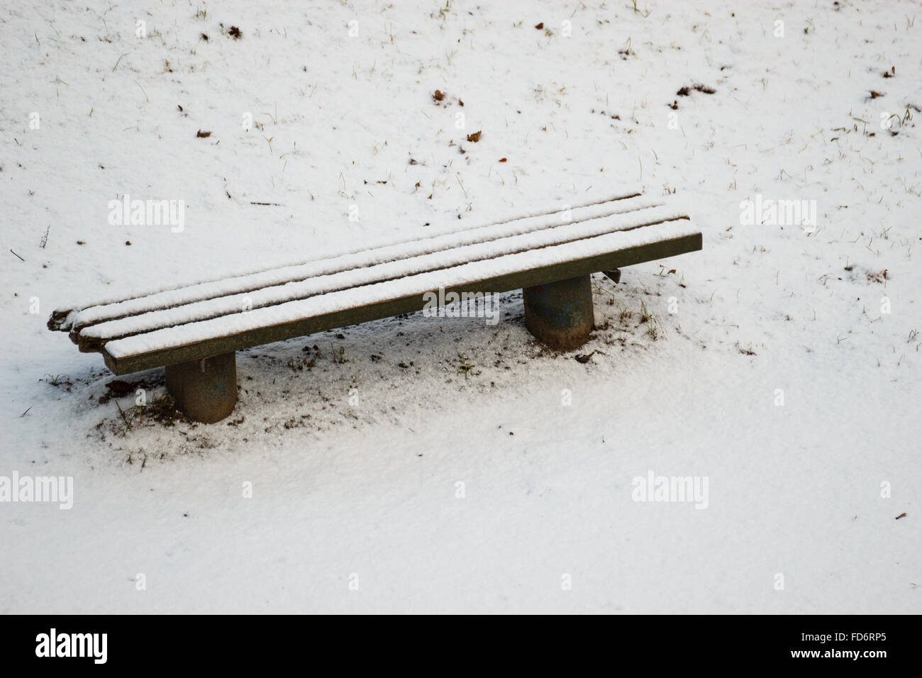 Winter bench covered with snow. Outdoor scene Stock Photo - Alamy