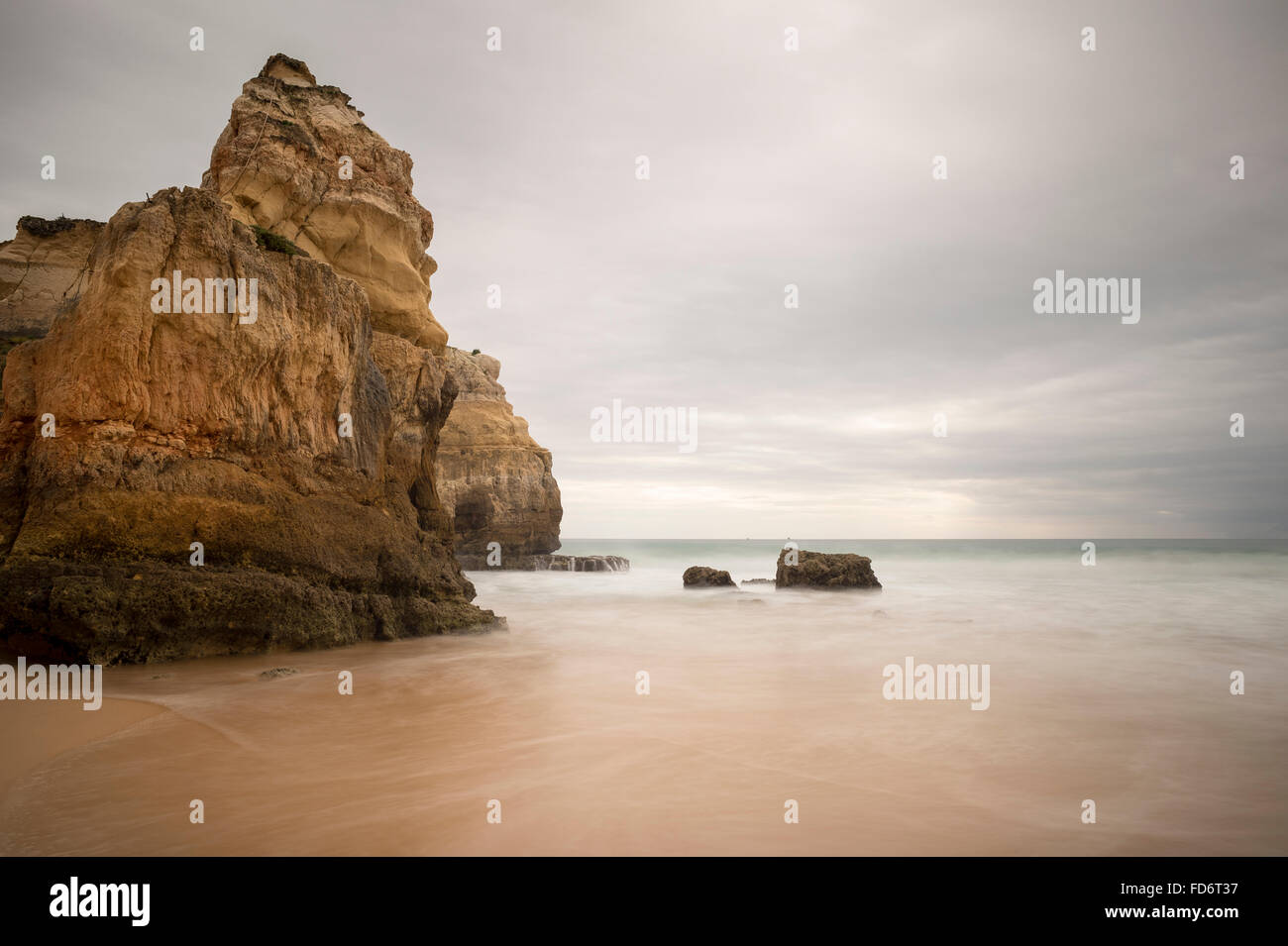Dramatic rocks and waves at praia do vau, beach near Alvor in the ...