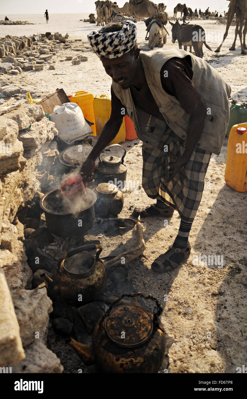 Man and Afar kitchen on lake Assale, Danakil depression, Afar Region ...