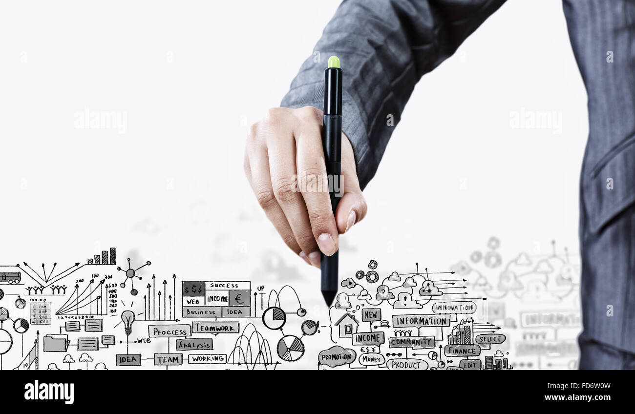 Close up of businessman hand drawing business plan and ideas Stock ...